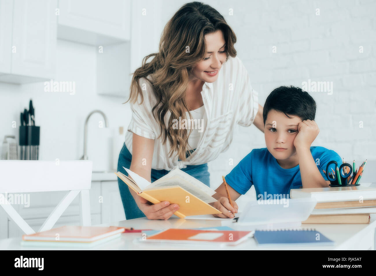 Boy homework boring hi-res stock photography and images - Alamy