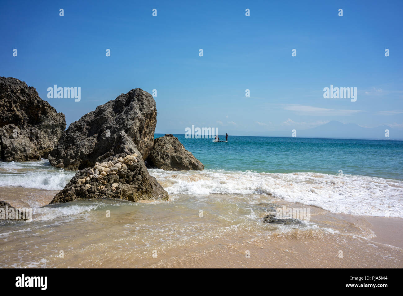 holiday scene with clear water and blue sky in Bali, Indonesia Stock ...