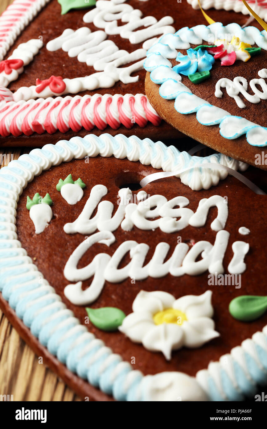 original bavarian Oktoberfest gingerbread heart on wood Stock Photo - Alamy