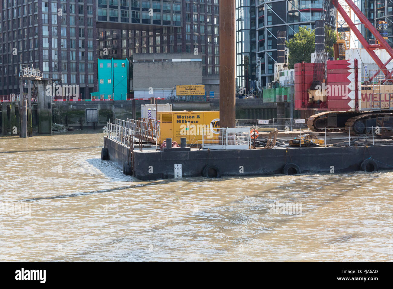 Construction barge on The River Thames Stock Photo - Alamy