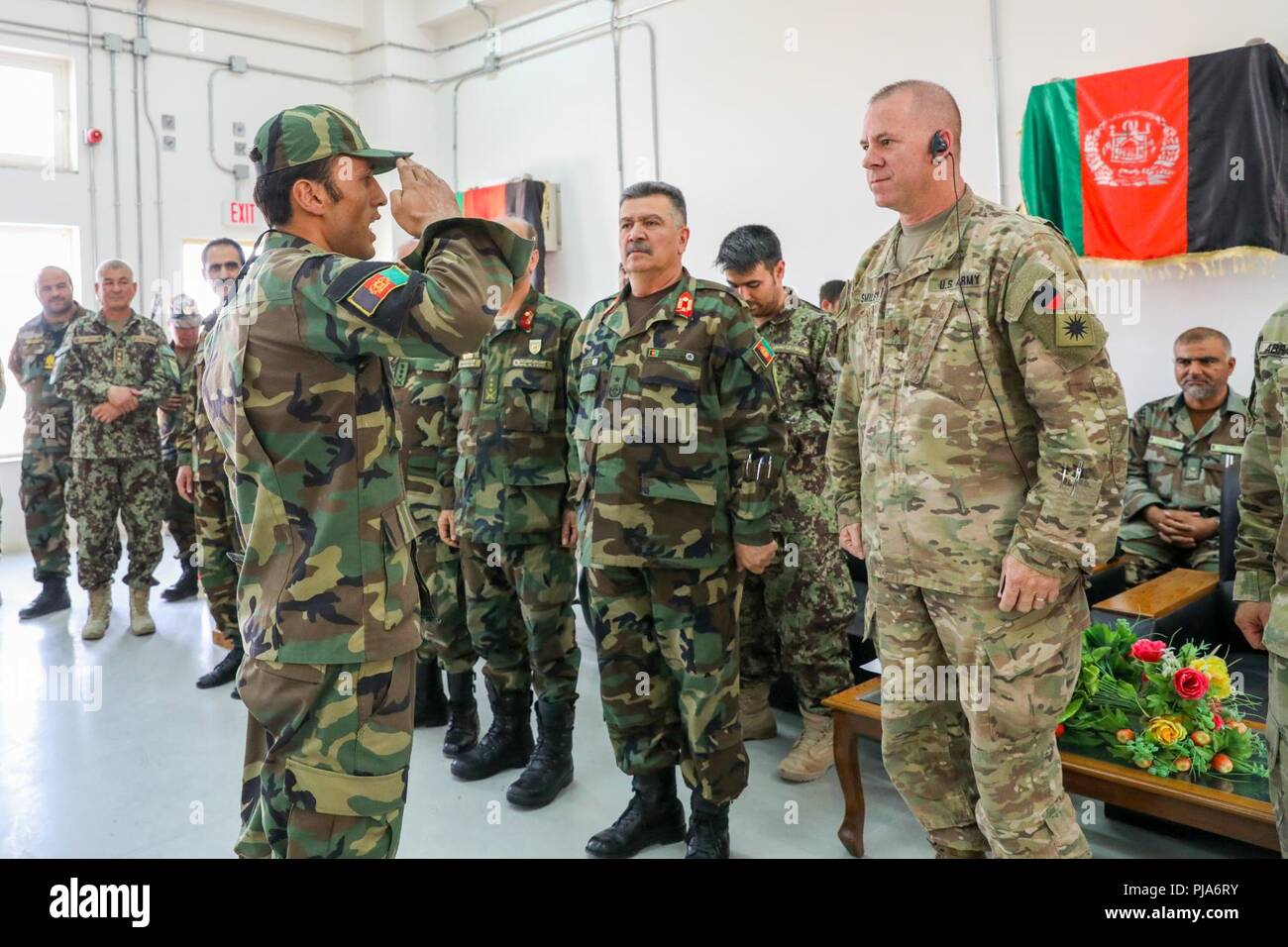 KANDAHAR, Afghanistan (July 5, 2018) --An Afghan soldier, left, salutes ...