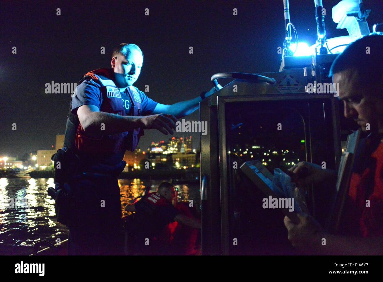 Petty Officer 2nd Class Jeptha Tanksley (left) and Petty Officer 2nd ...