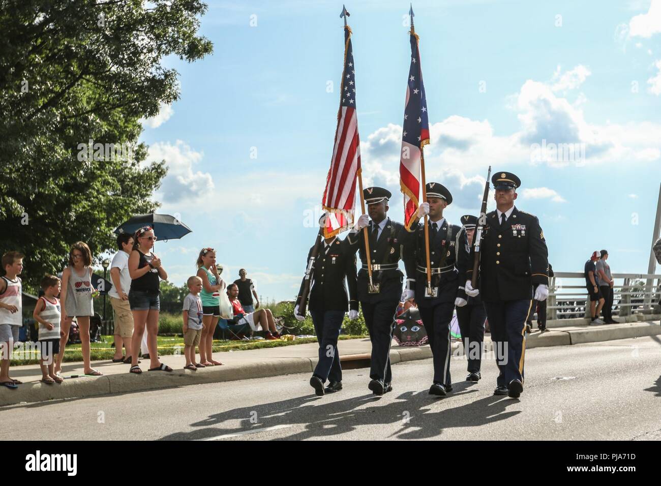 An Ohio National Guard joint color guard marches in the Red, White ...