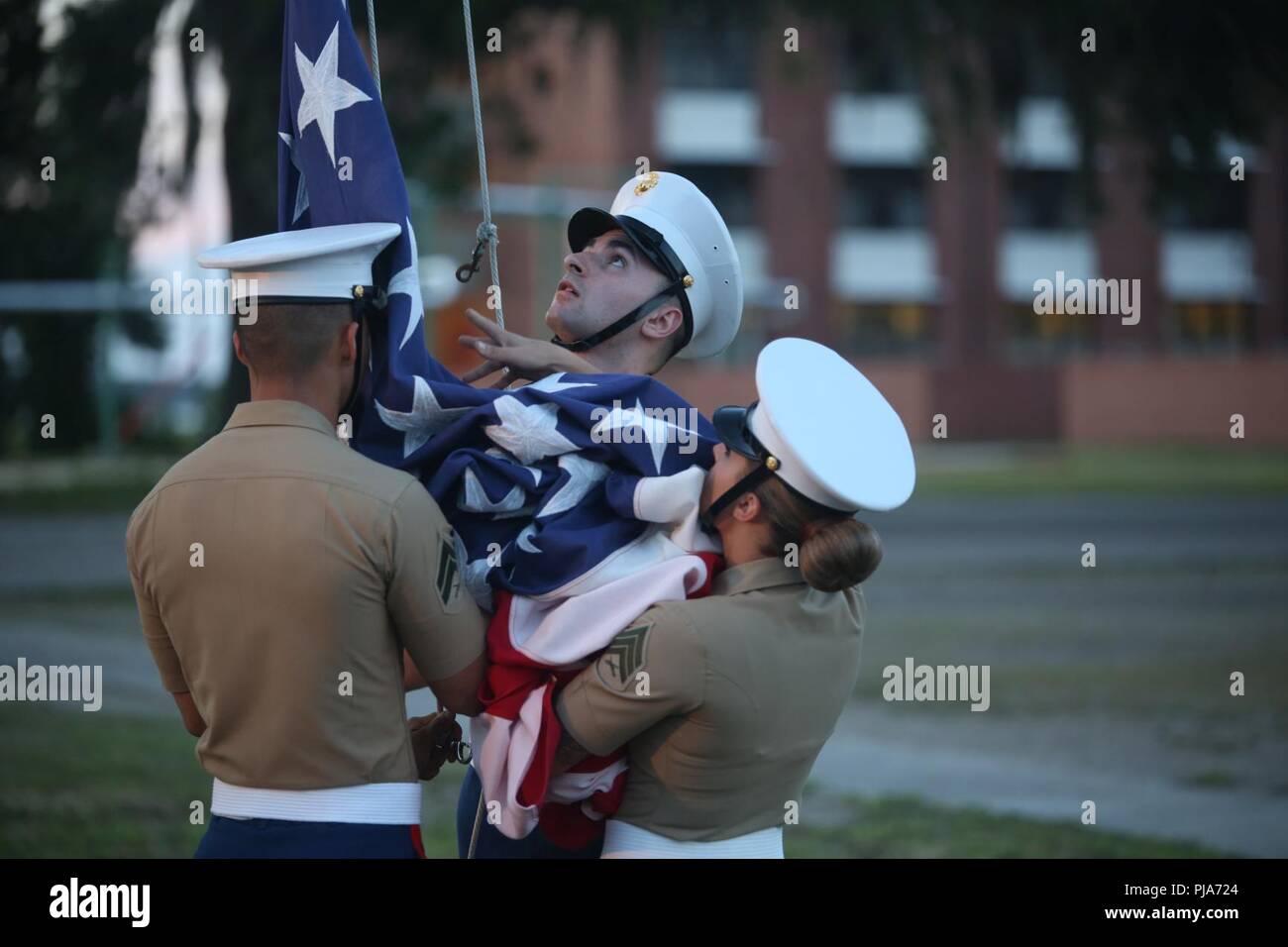 Marines conduct evening colors during an Independence Day celebration ...