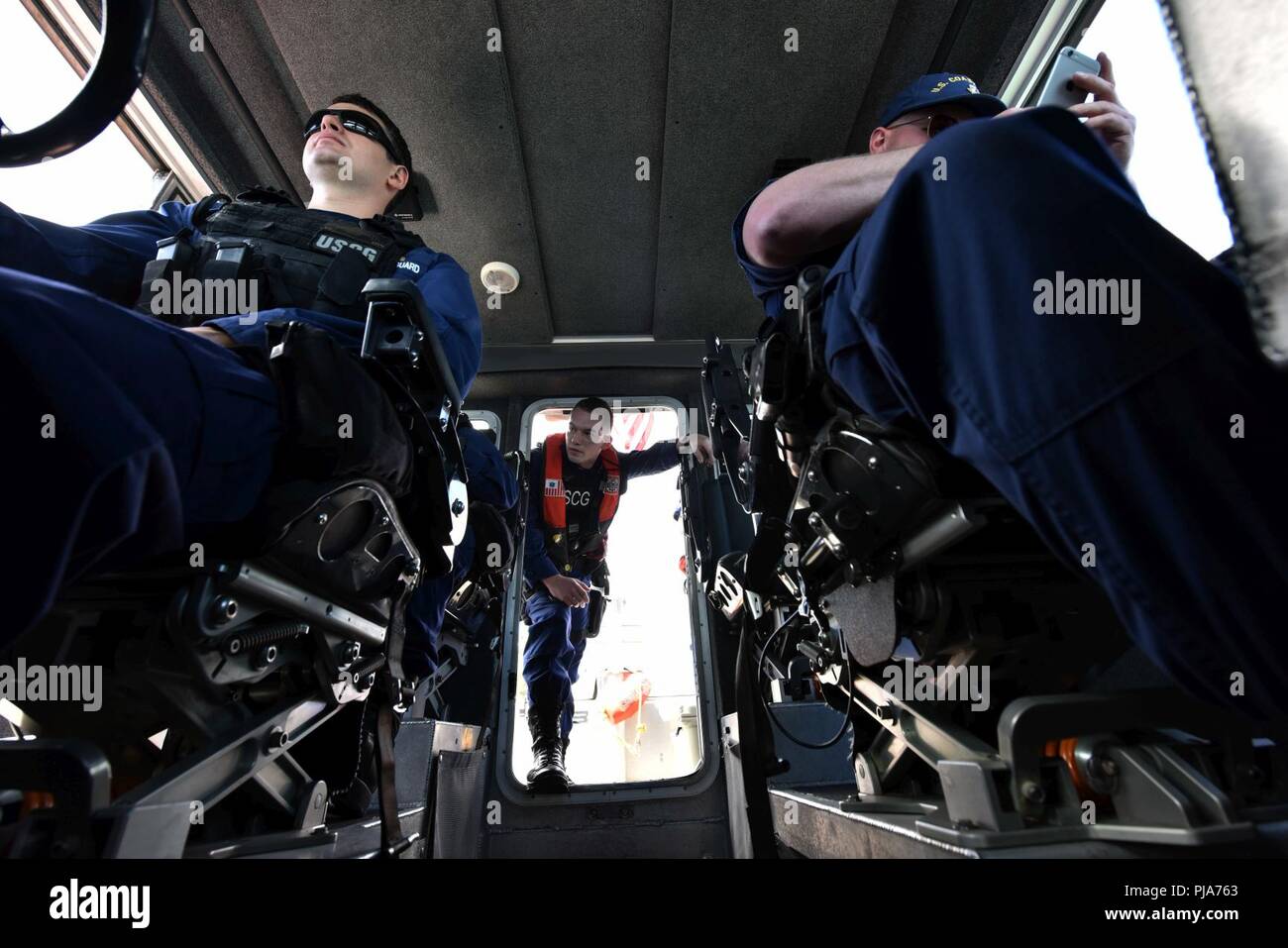 A Coast Guard boat crews prepares to patrol the waters of Lake Coeur d ...