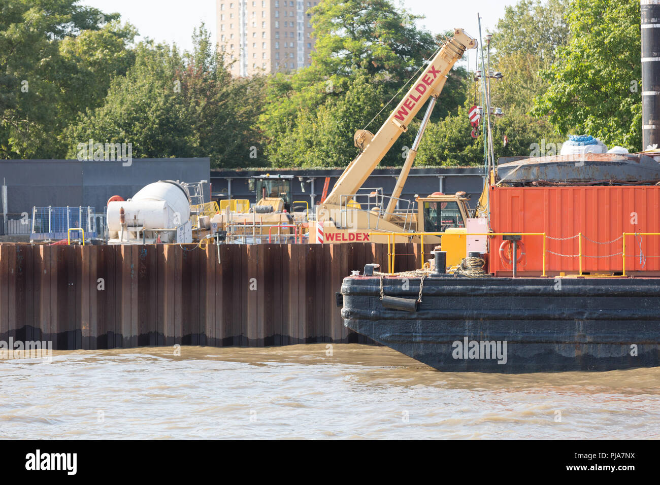 Construction barge on The River Thames Stock Photo - Alamy