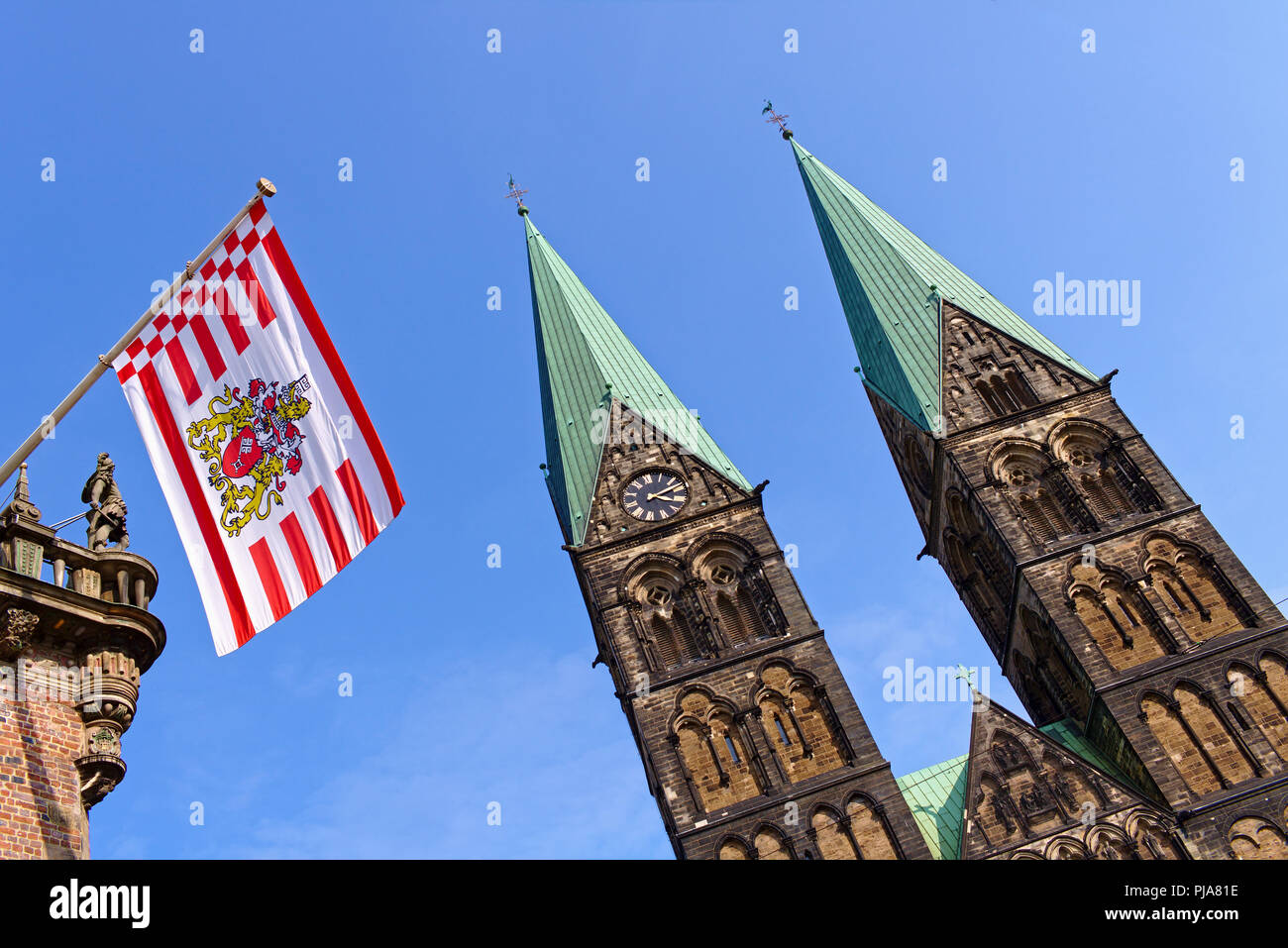 Bremen, Germany - St. Petri cathedral and the Bremen state flag flying ...