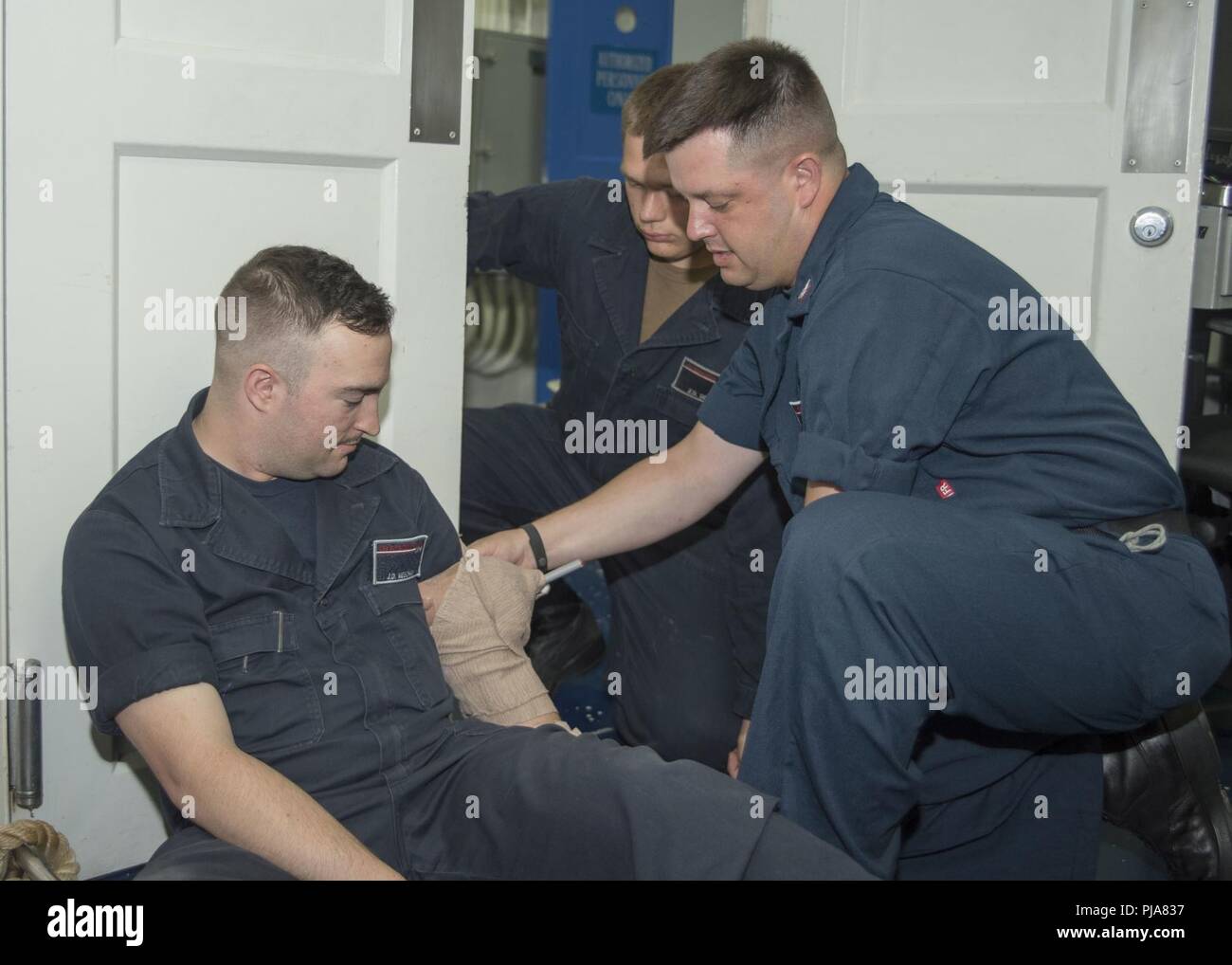 U s navy hospital corpsman demonstrates hi-res stock photography and ...