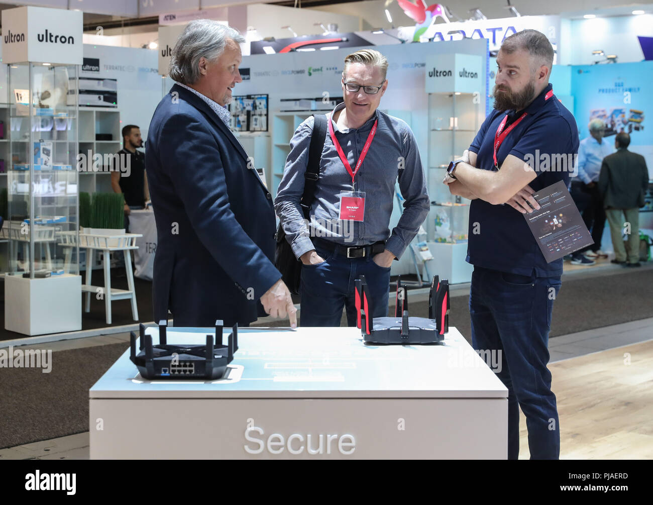 Berlin, Germany. 5th Sep, 2018. Visitors learn about wireless routers ...