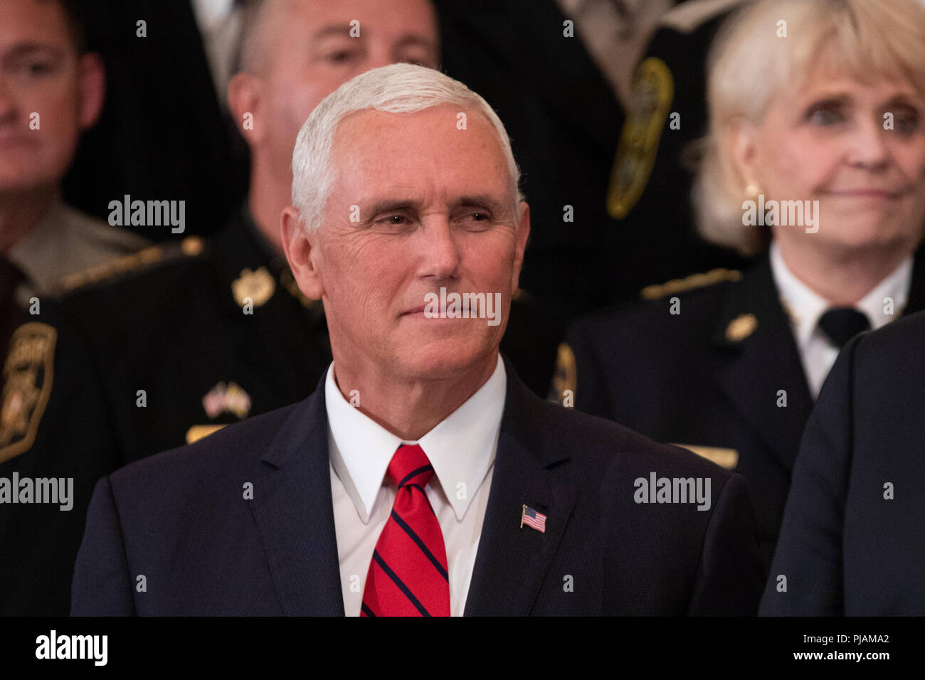 United States Vice President Mike Pence looks on as Thomas Hodgson, the ...
