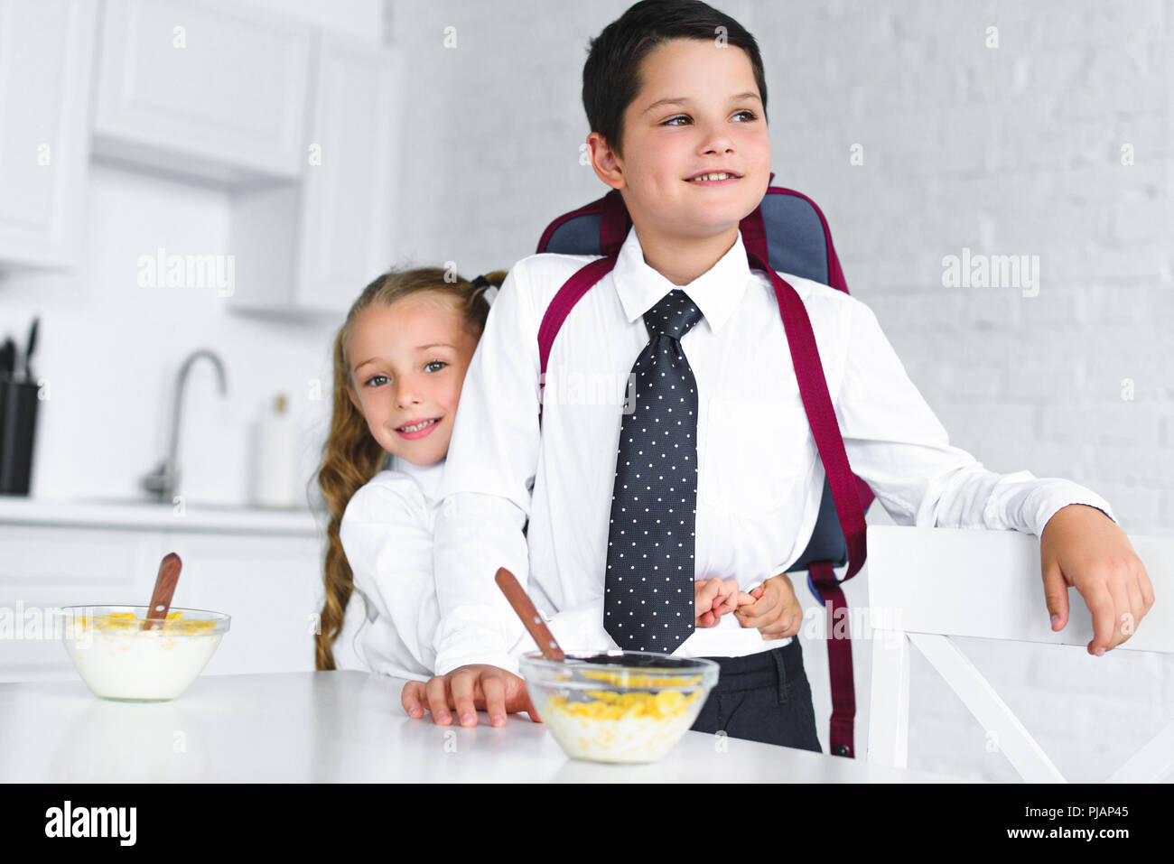 Brother sister in school uniform hi-res stock photography and images ...