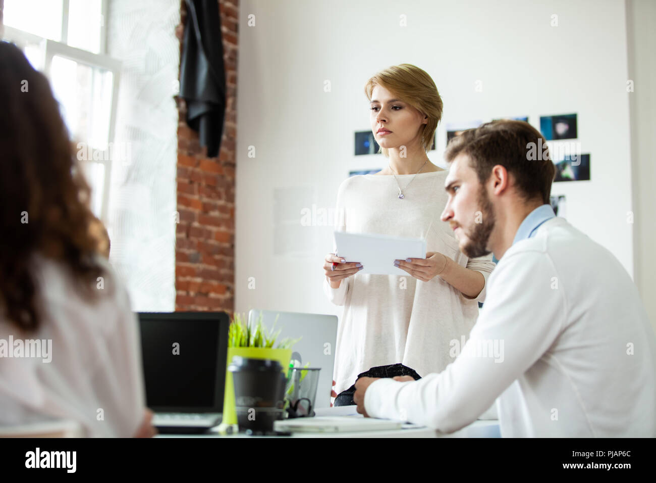 Business partners sharing ideas hi-res stock photography and images - Alamy