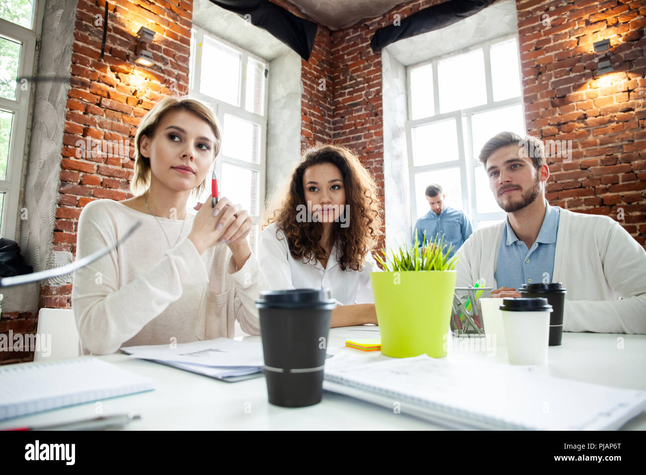 Business partners sharing ideas hi-res stock photography and images - Alamy