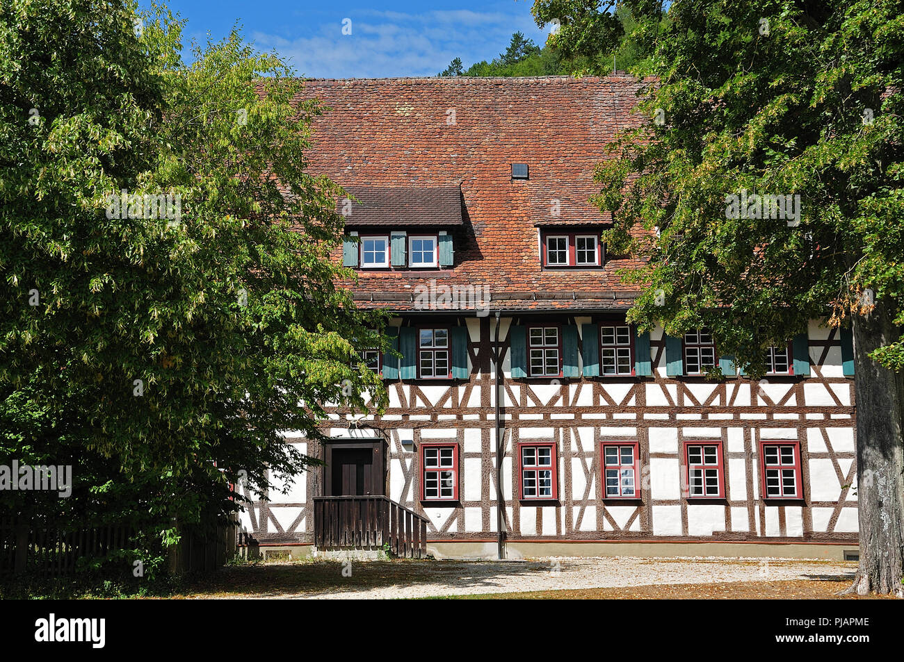 medieval building with half-timbered facade in monastery yard of ...