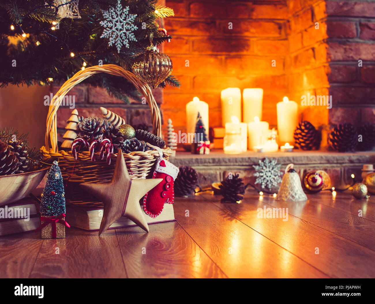 Christmas setting background: wooden star in front of decorated ...