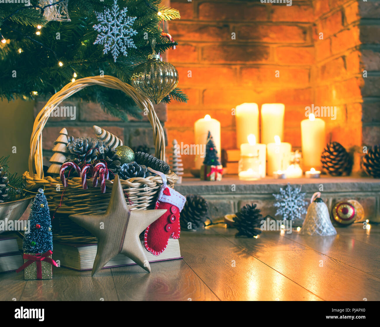 Christmas setting background: wooden star in front of decorated ...