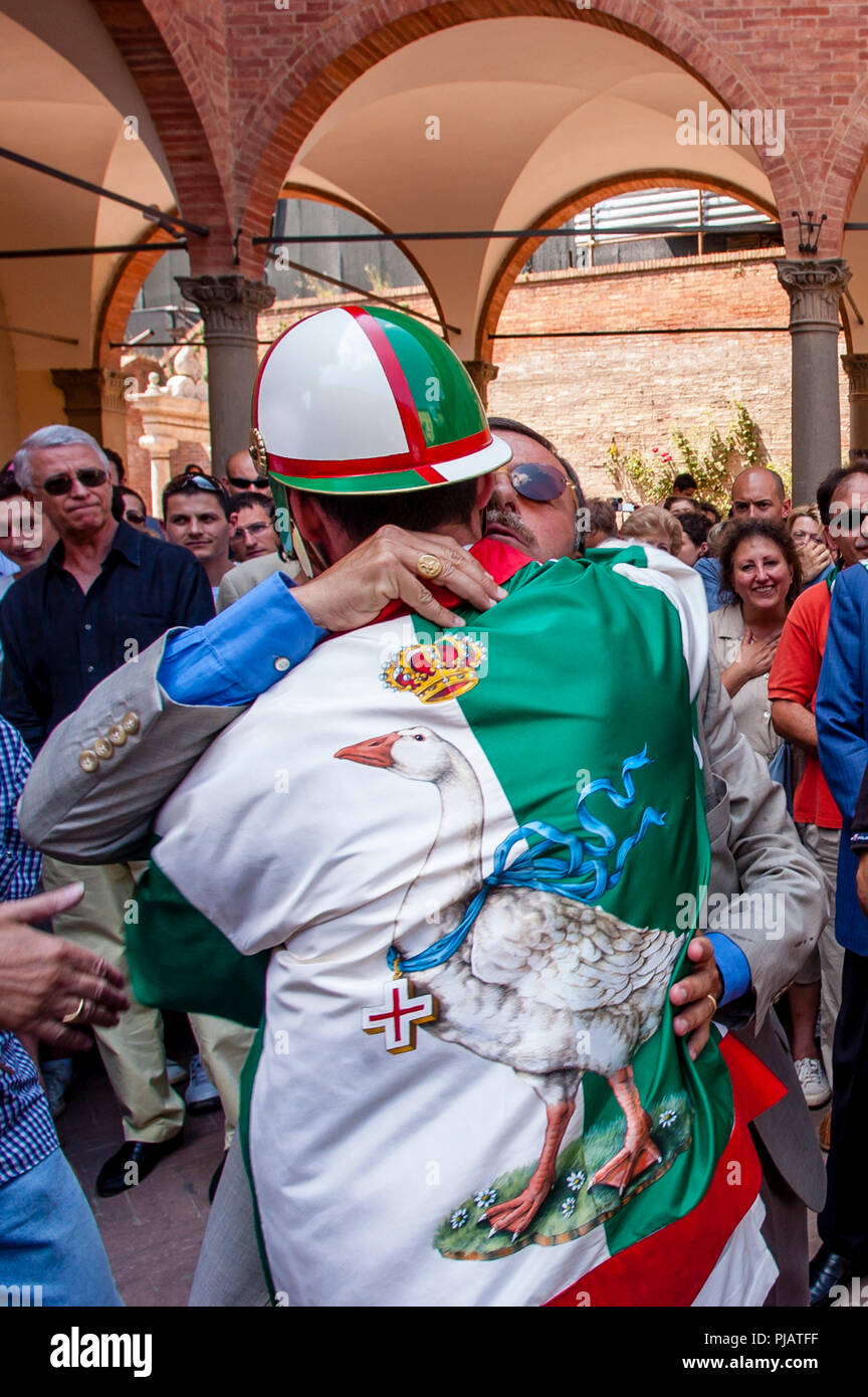 The Contrada Members Hug Their Jockey After The Blessing Of The Horses ...
