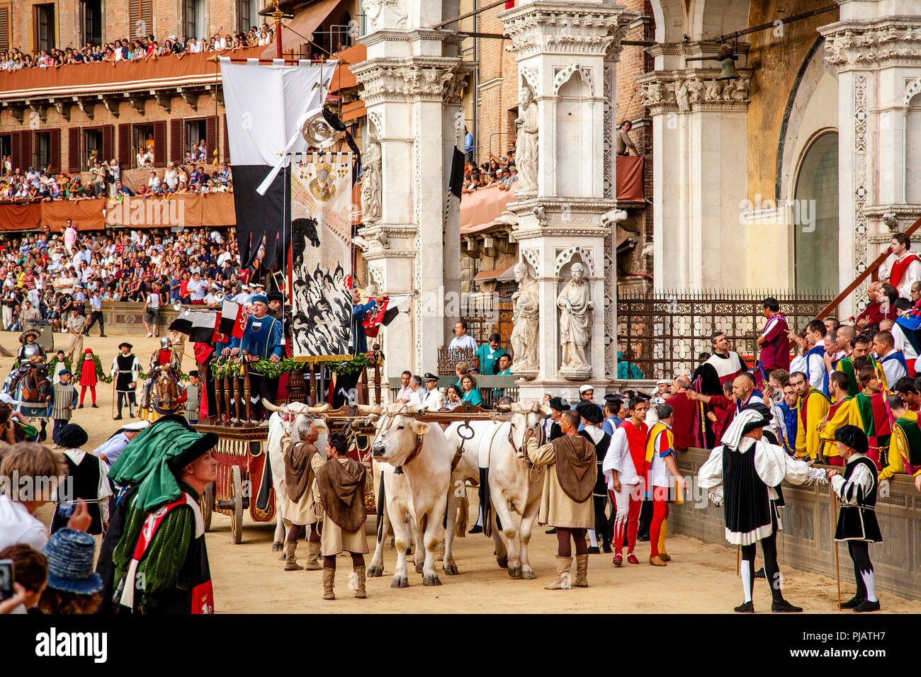 The Palio Silk Banner Is Paraded Around The Square During The Corteo ...