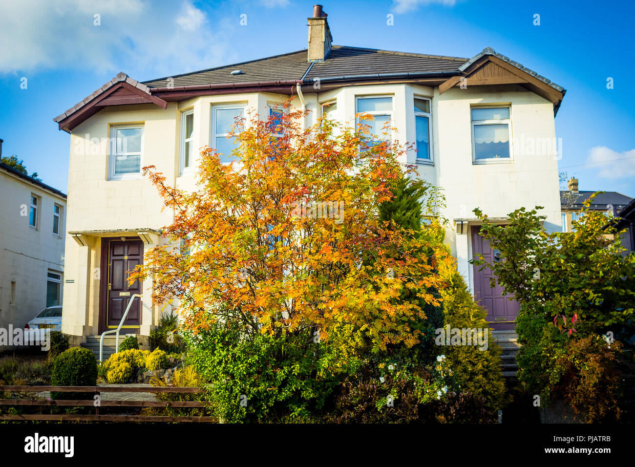Beautiful, old traditional British house during Autumn, with autumnal ...