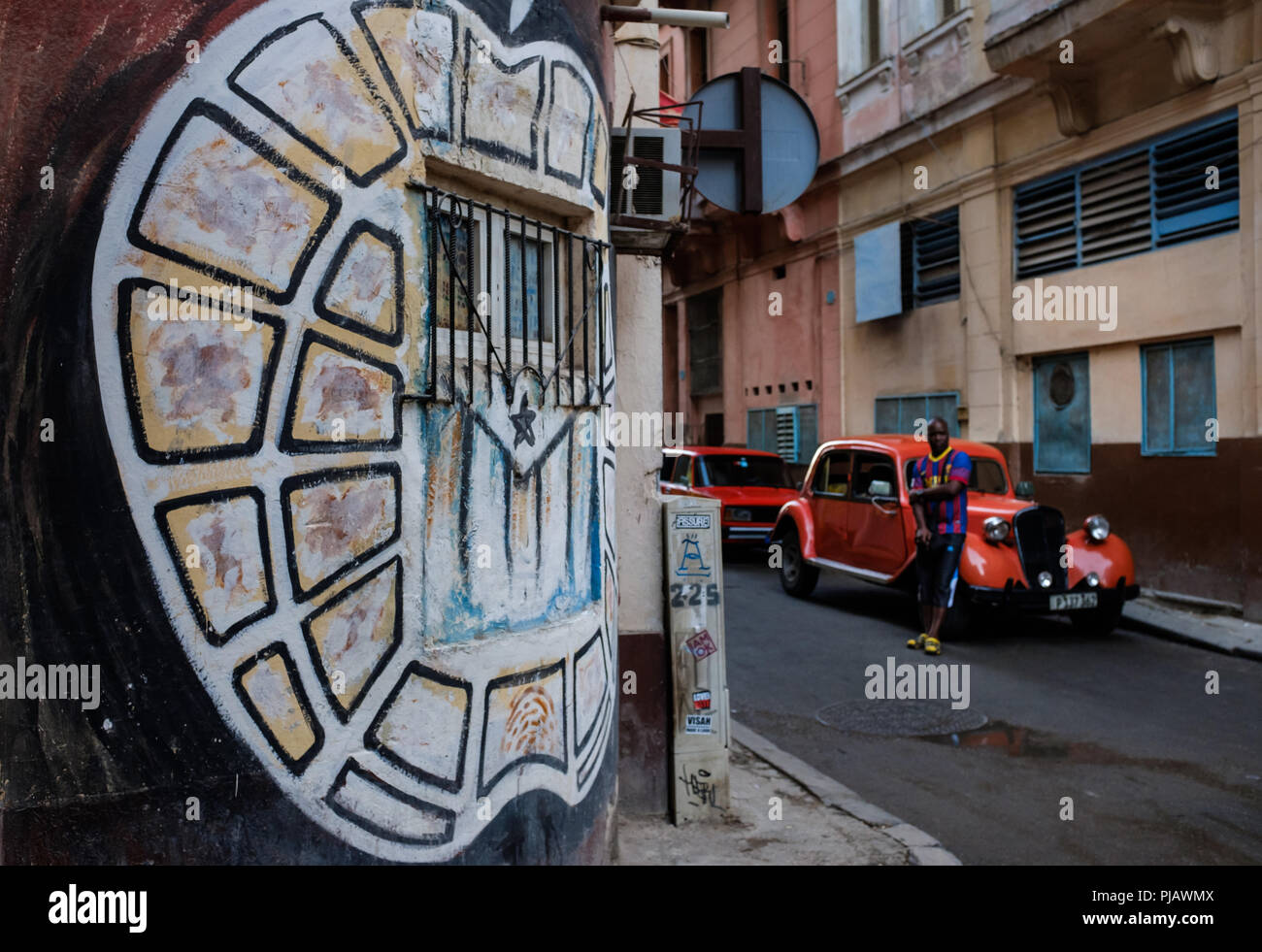HAVANA, CUBA - CIRCA MARCH 2017: Graffiti art and old classic car in ...