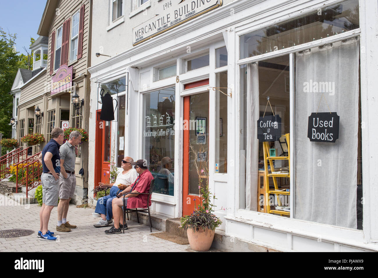 People talking to each other on a sidewalk in Stockbridge, MA Stock ...