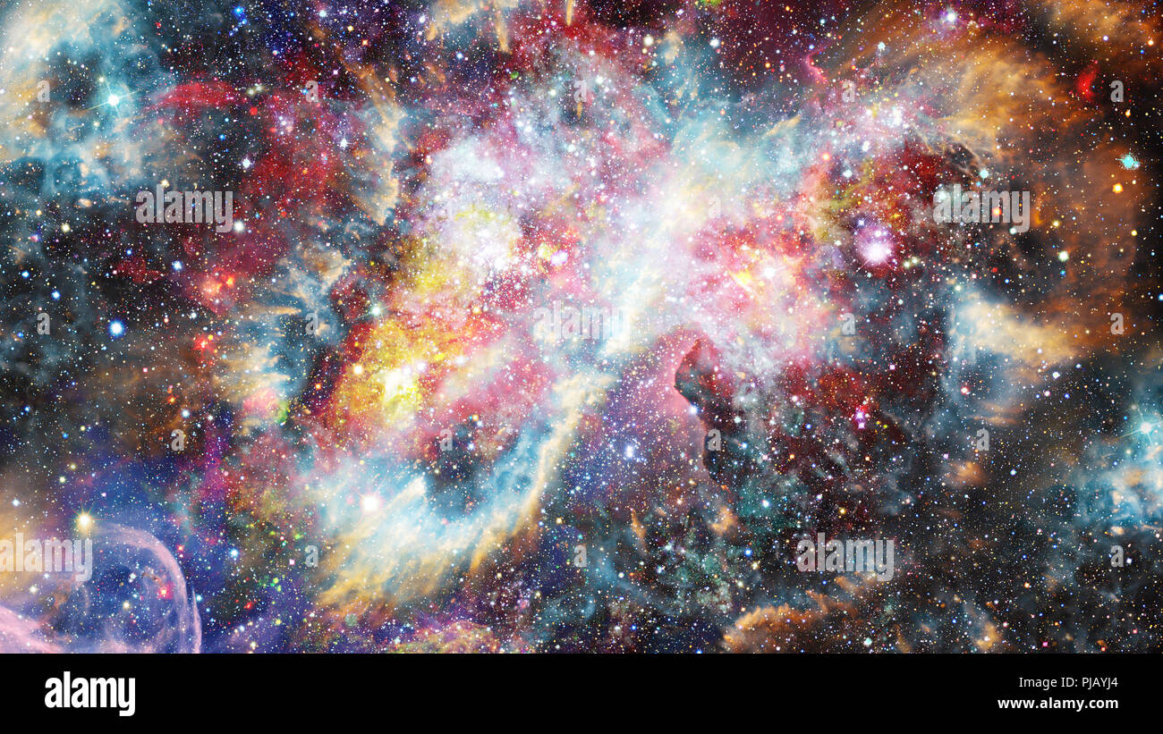 Colored clouds in nebula. Combined version of Hubble space telescope ...