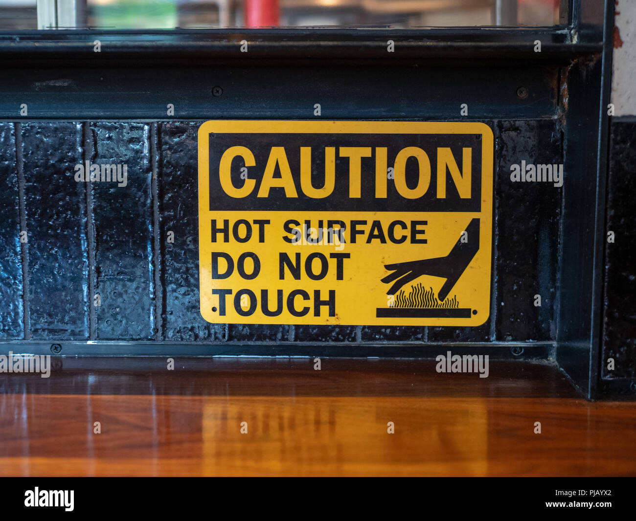 Caution hot surface sign hi-res stock photography and images - Alamy