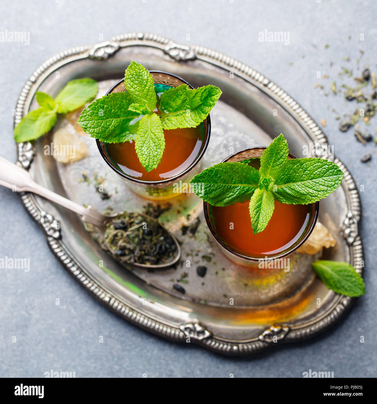 Mint tea, Moroccan traditional drink in glass. Top view Stock Photo - Alamy