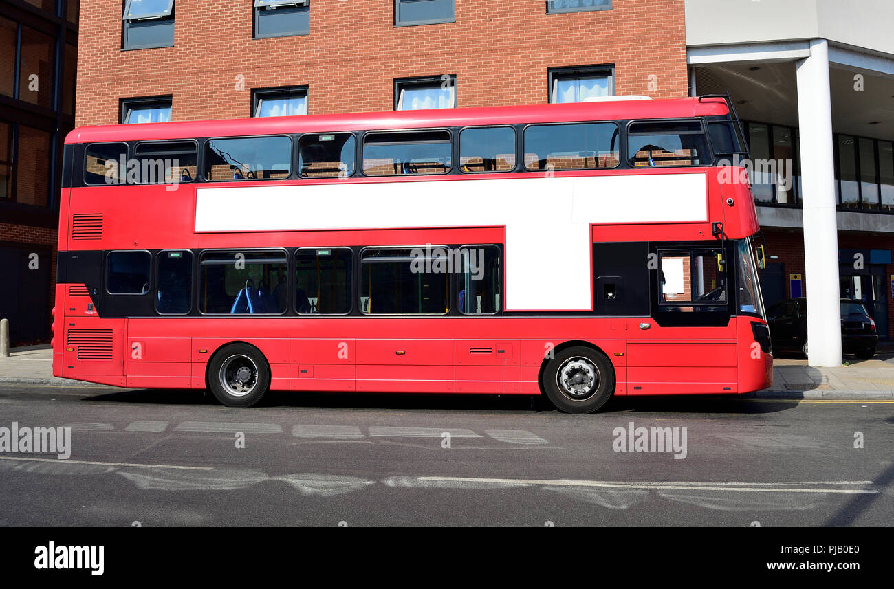 Double Decker red bus is running on road in London Stock Photo - Alamy