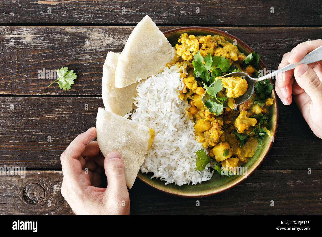 Man eating curry hi-res stock photography and images - Alamy