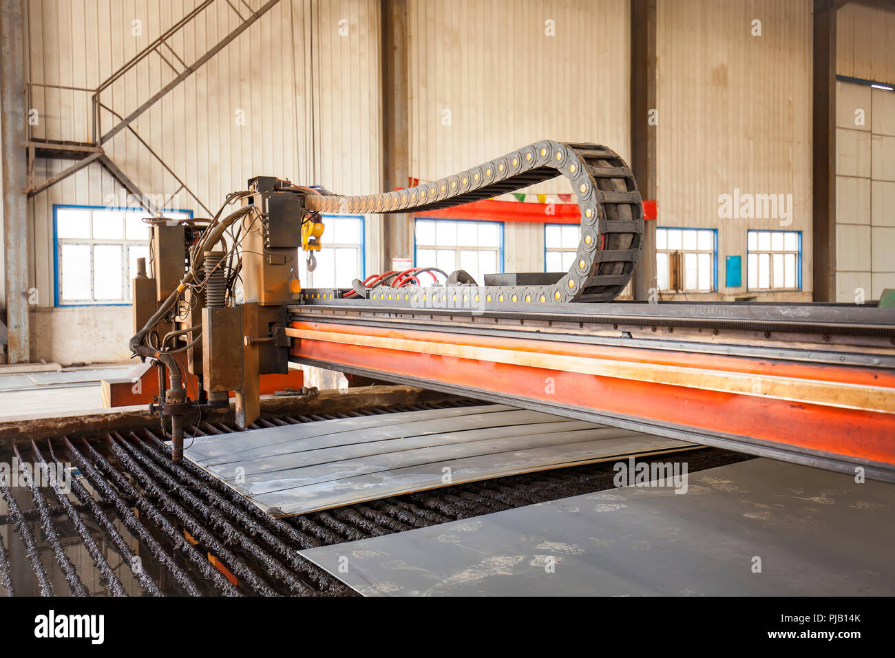 plasma torches cutting machine in mechanical shop Stock Photo - Alamy