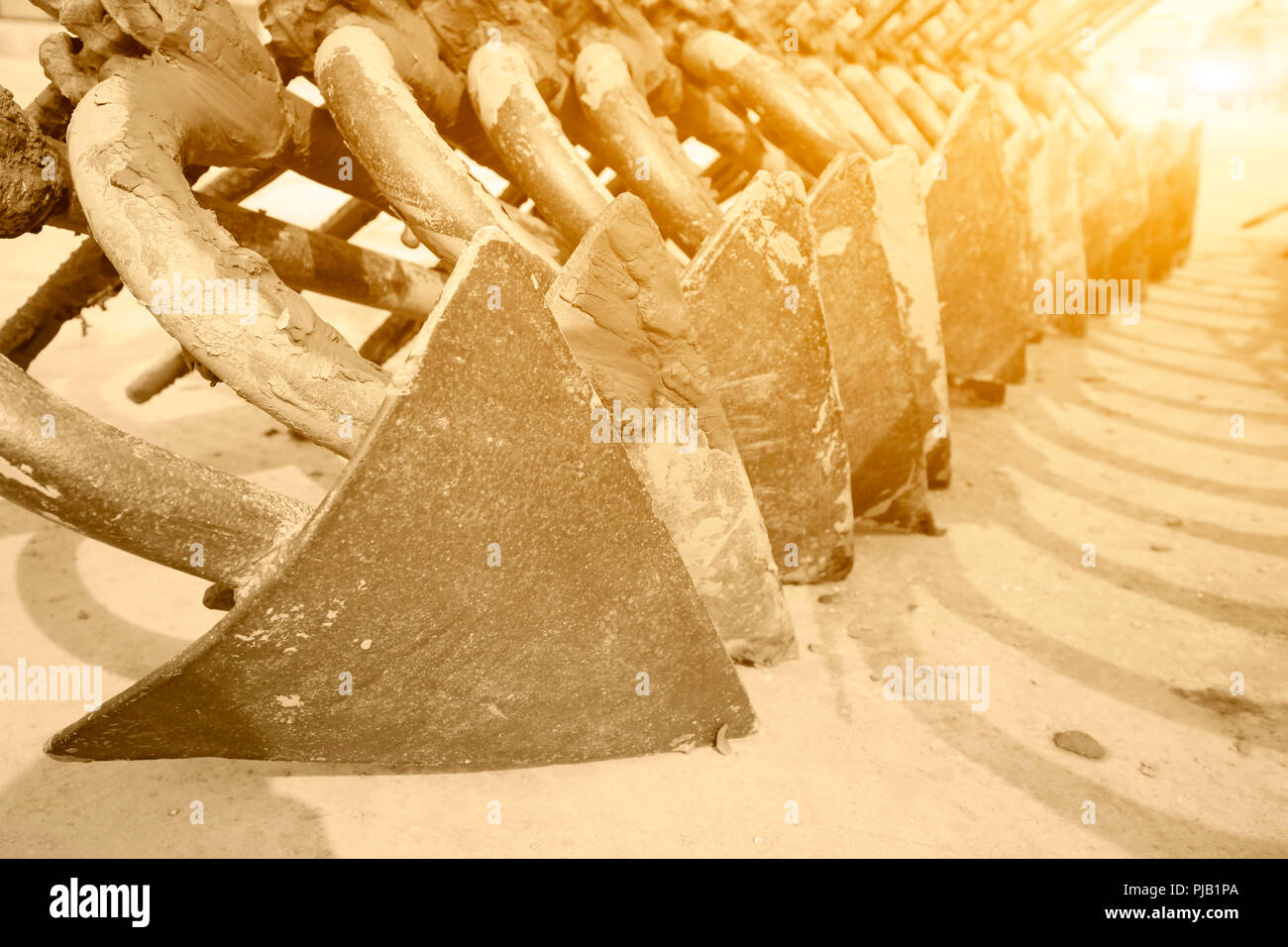 The rusty iron anchor Stock Photo - Alamy