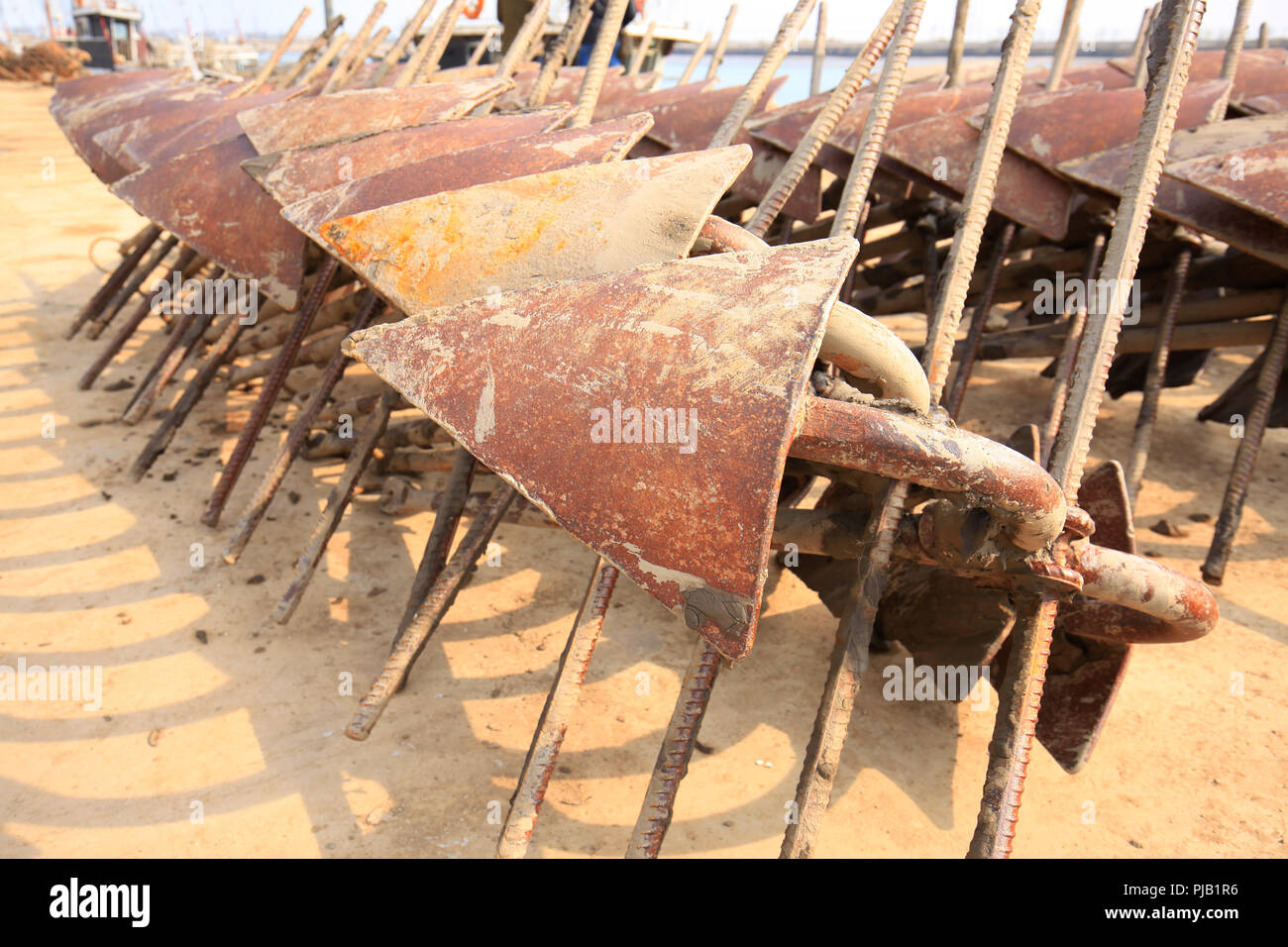 The rusty iron anchor Stock Photo - Alamy
