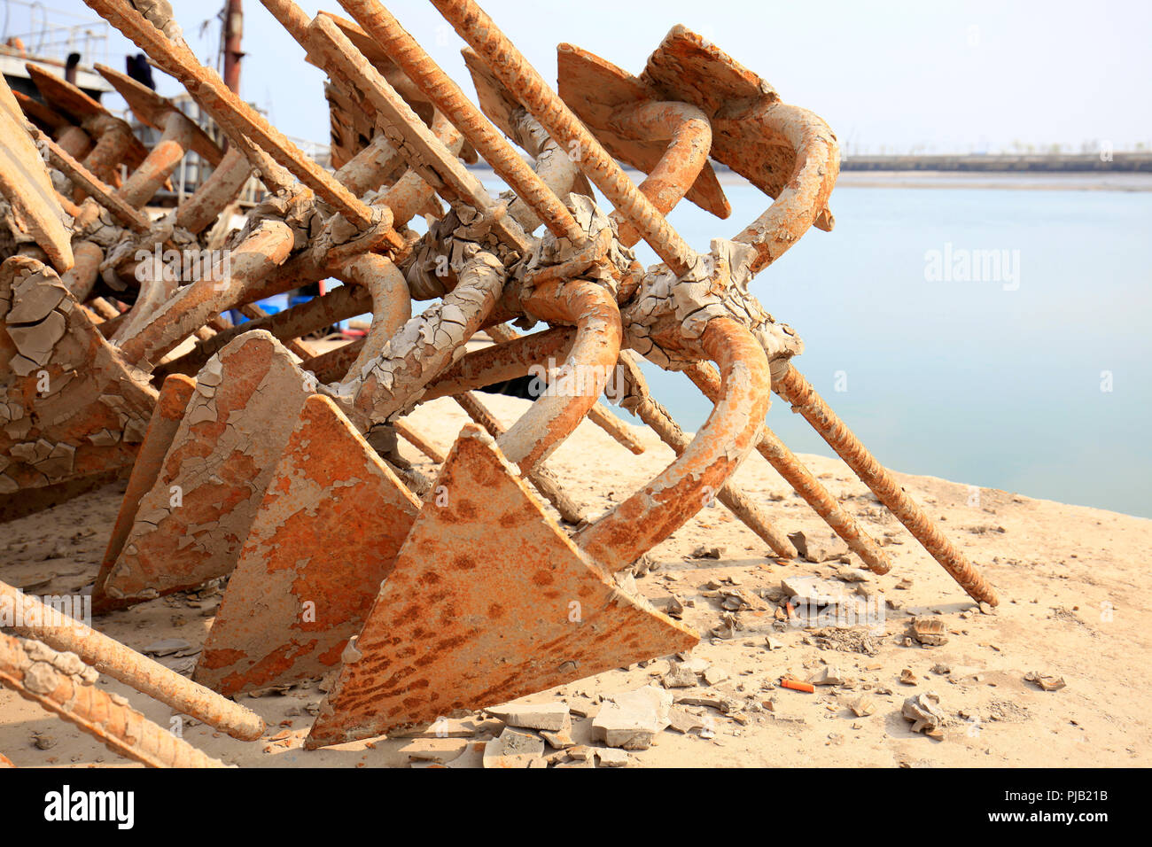 The rusty iron anchor Stock Photo - Alamy
