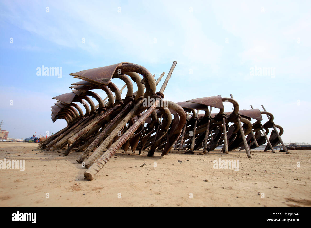 The rusty iron anchor Stock Photo - Alamy