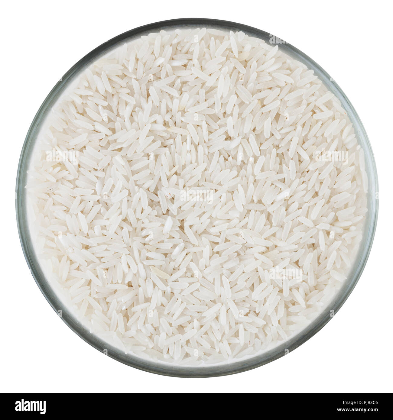 Uncooked white long-grain jasmine rice isolated on white background ...