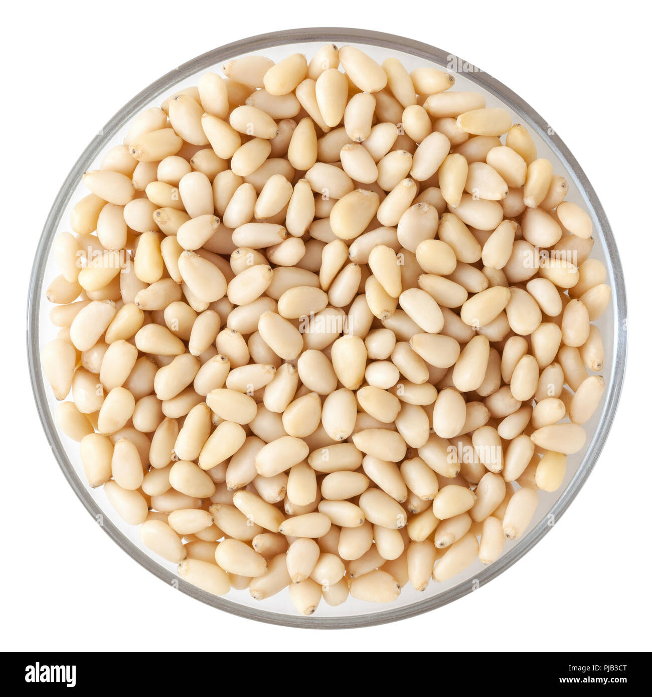 Shelled cedar pine nuts isolated on white background with clipping path ...