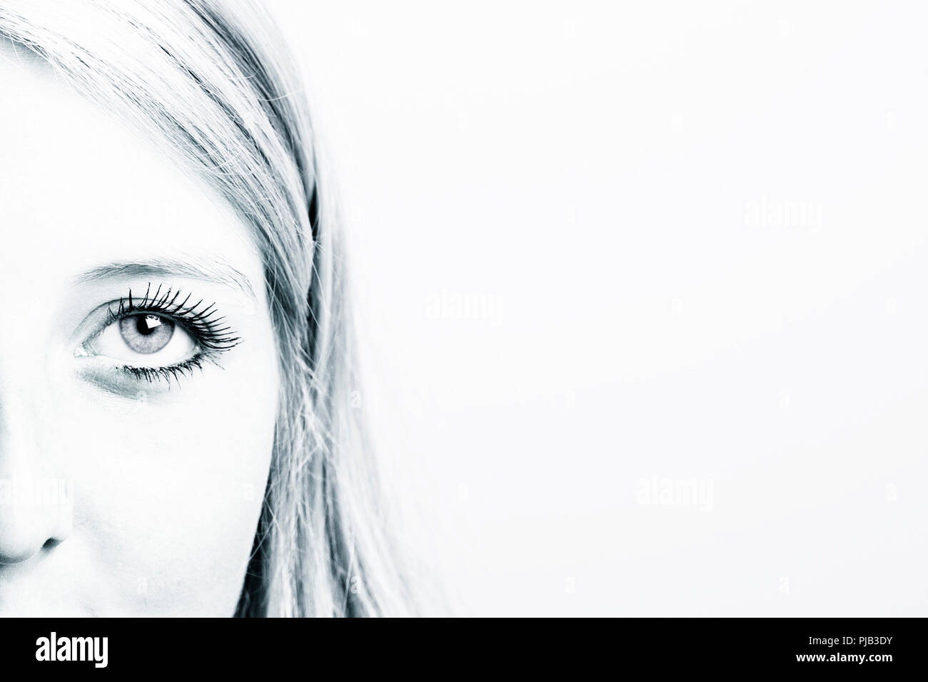 Girl half face hi-res stock photography and images - Alamy