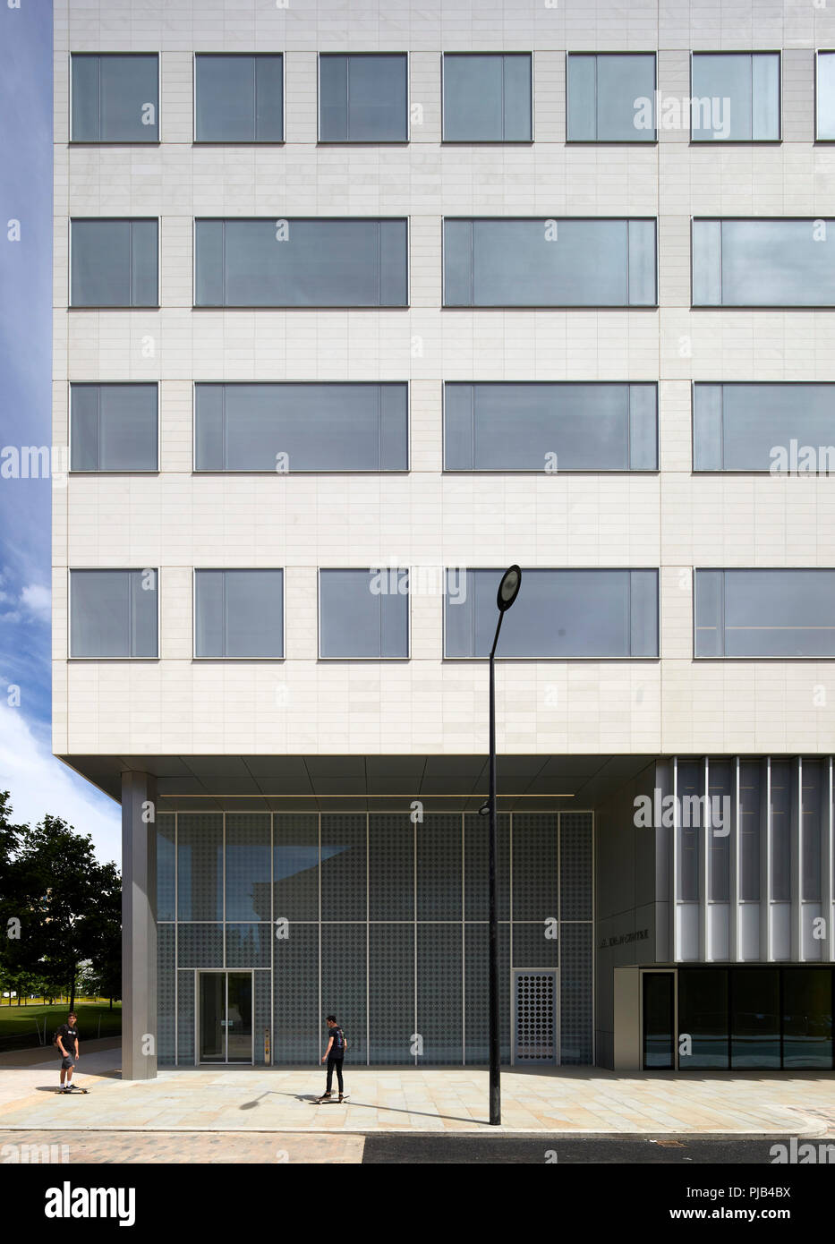 Exterior facade with view towards the building entrance. Aga Khan ...