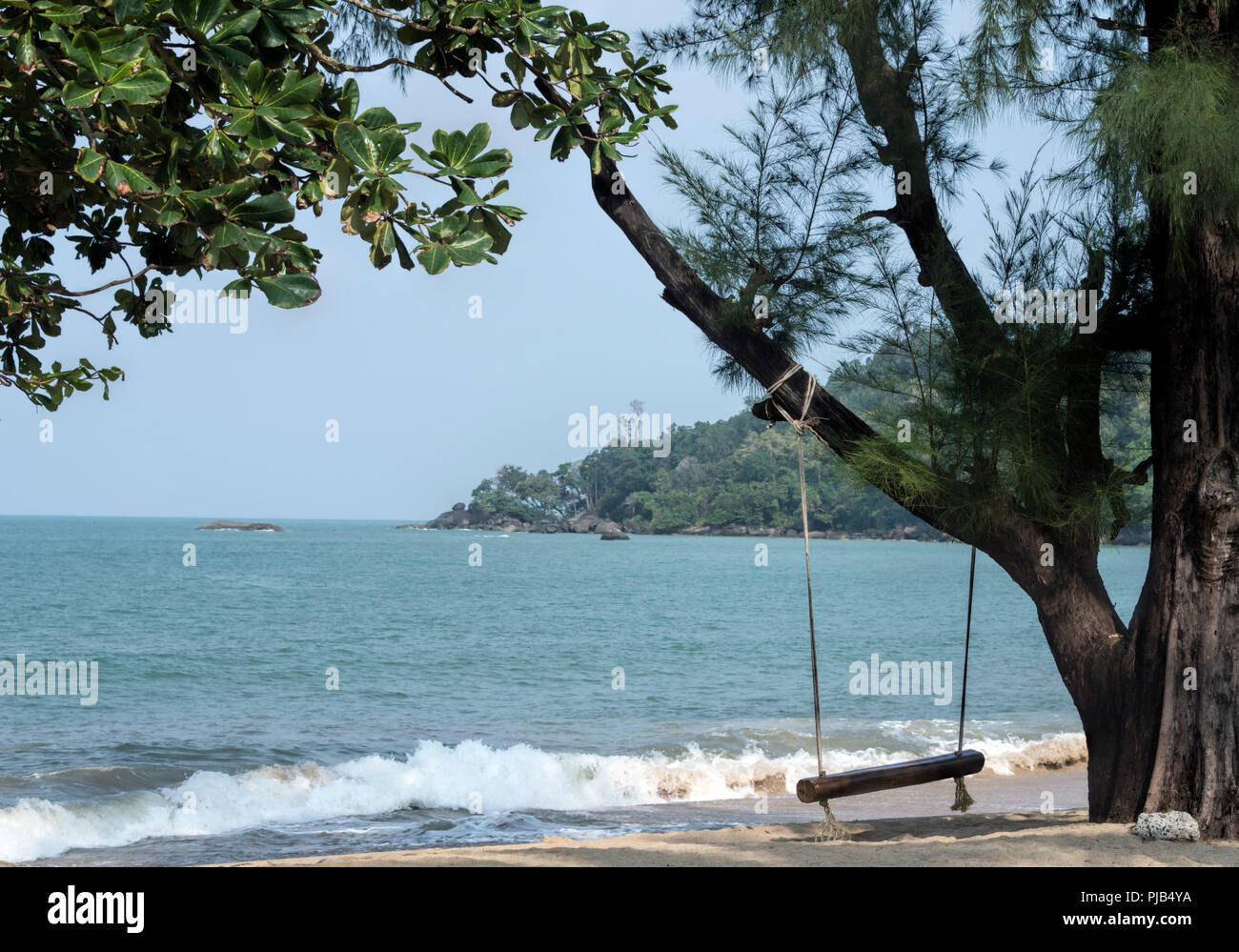 Rope swing on beach hi-res stock photography and images - Alamy