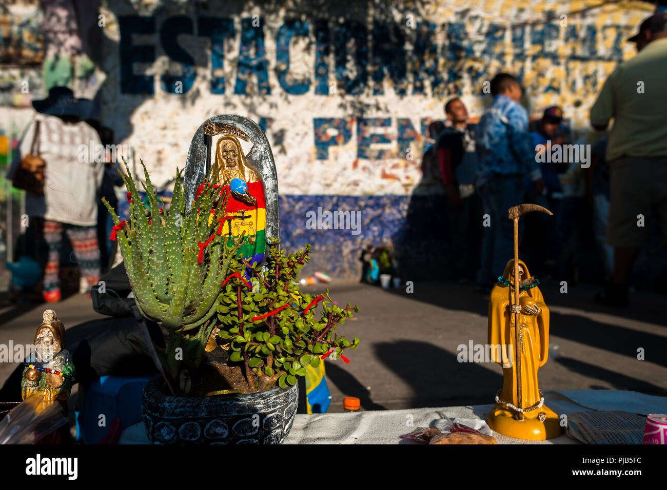Statues of Santa Muerte (Holy Death) are seen placed on the street ...
