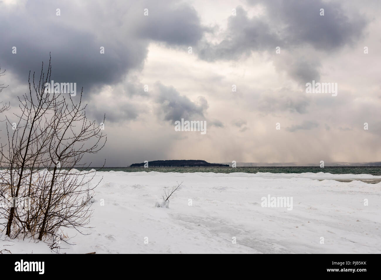 Ice snow covered bank grand traverse bay power island hi-res stock ...