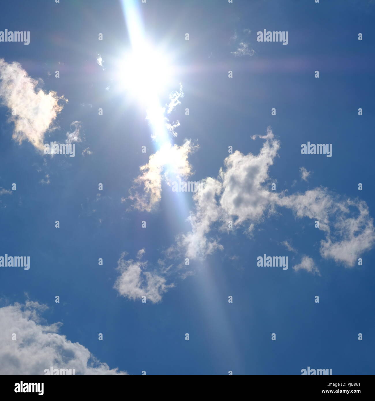 Sunshine with clouds hi-res stock photography and images - Alamy