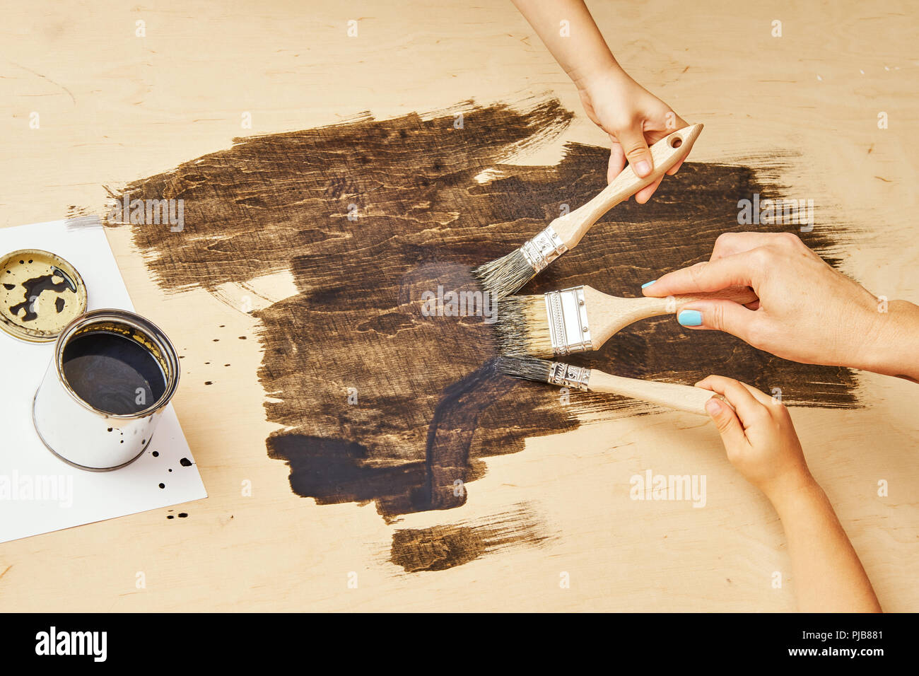 Children paint brush floor hi-res stock photography and images - Alamy