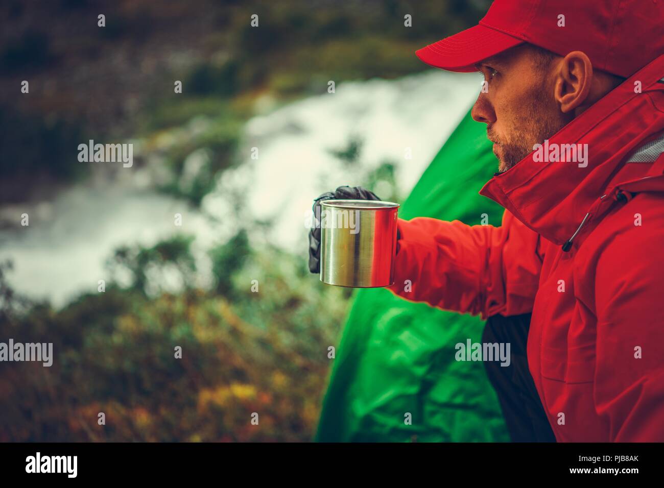 Campsite Hot Tea Time. Caucasian Outdoor Man Taking the Moment For the ...
