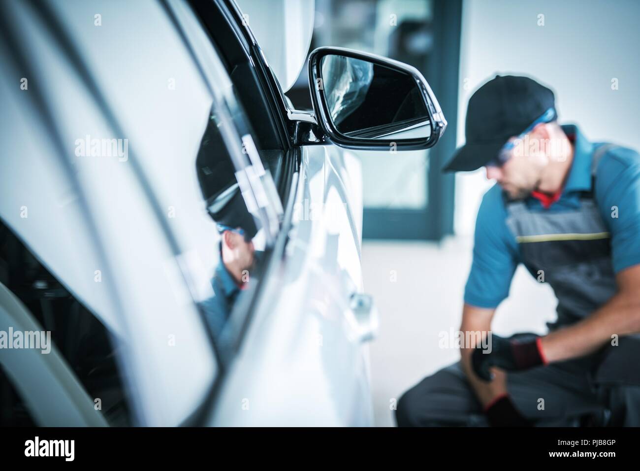 Servicing Modern Car Automotive Theme. Caucasian Auto Service Worker ...