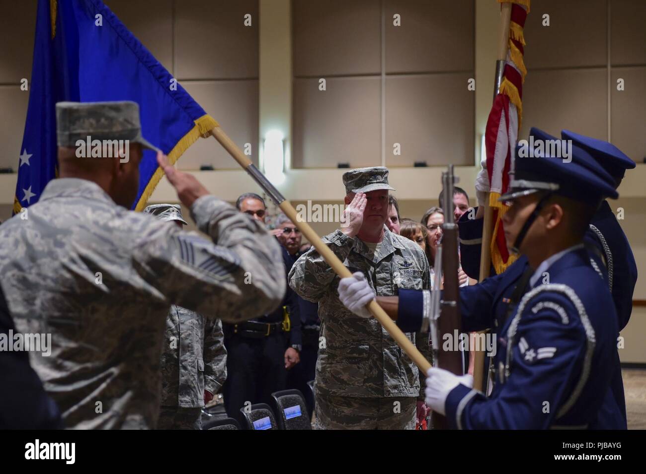 Col. Robert Riegel, 460th Space Wing vice commander, salutes the ...