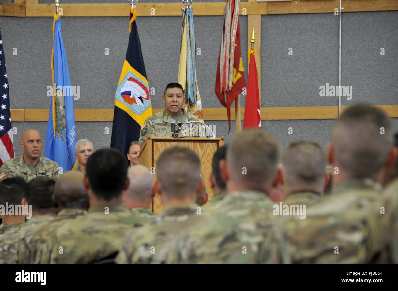 Capt. Warren C. Queton, commander of the 1245th Transportation Company ...