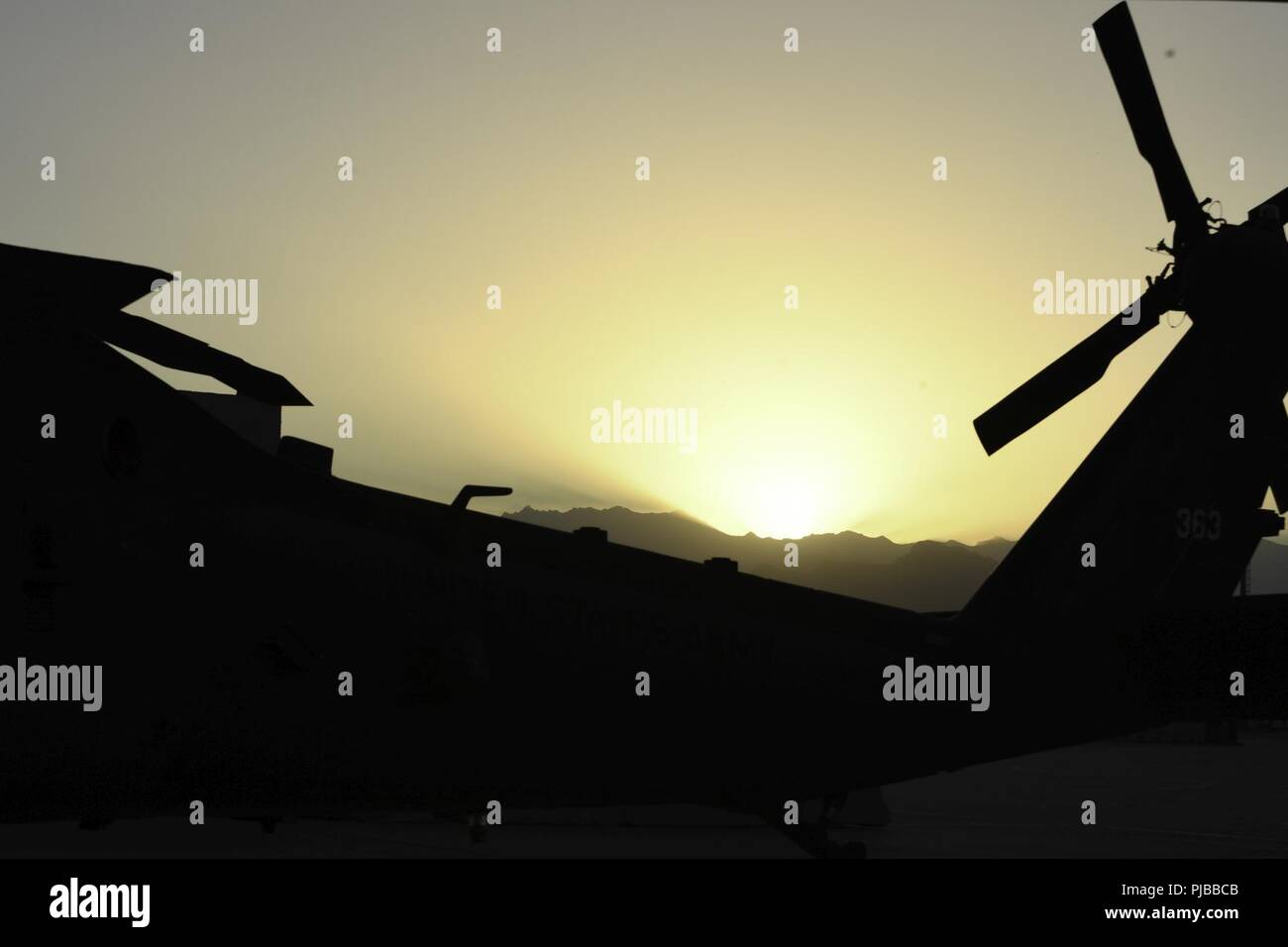 The sun rises over the mountains in eastern Afghanistan shedding light ...