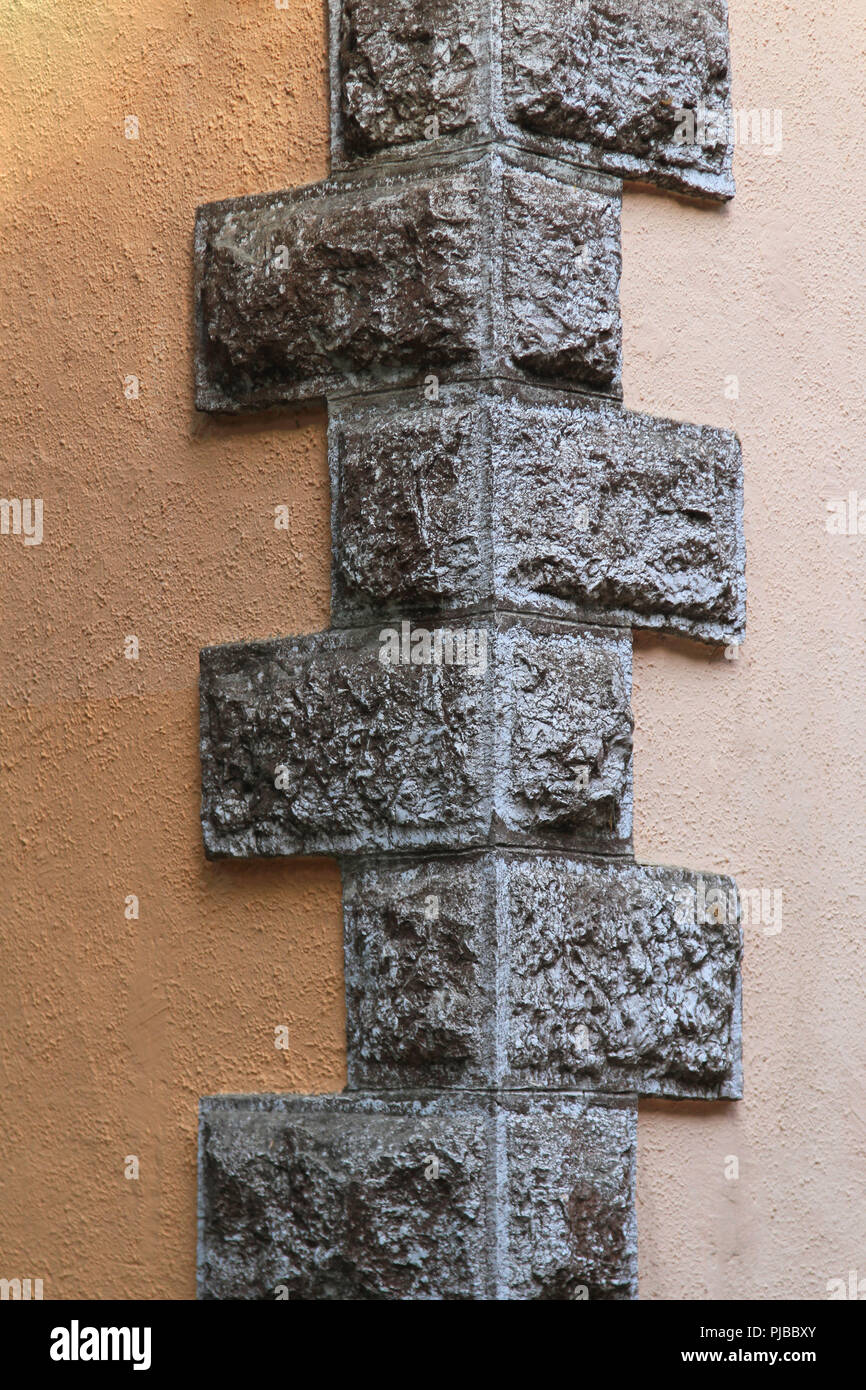 Architecture detail of old stone building corner Stock Photo - Alamy